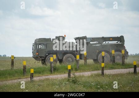 British army MAN SVR (Support Vehicle Recovery) 8x8 Truck towing a ...
