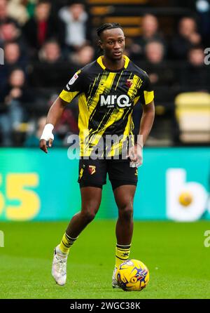 Vakoun Issouf Bayo of Watford in action with Jacob Greaves heads clear ...