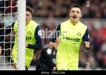 Sunderland's Nazariy Rusyn (right) celebrates scoring their side's ...