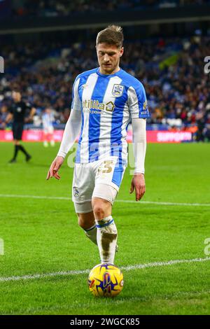 Ben Wiles #23 of Huddersfield Town has a shot at goal during the Sky ...