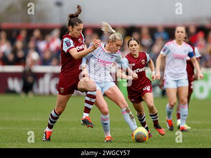 Arsenal's Alessia Russo (left) and West Ham United's Amber Tysiak ...