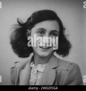 Passport photo of Anne Frank from a photo album, age 13, taken at ...