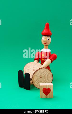 The colorful wooden Pinocchio toys Stock Photo - Alamy