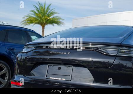 OCALA, FLORIDA USA - January 3, 2024 Porsche dealership with red logo ...