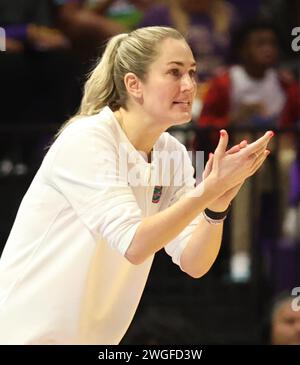 Florida head coach Kelly Rae Finley, left, talks with guard Liv McGill ...