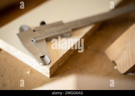 Vernier caliper lying on mechanical scheme Stock Photo - Alamy