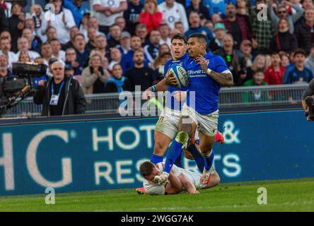 Italy's Montanna Ioane (L) scores a try during the second half of a ...