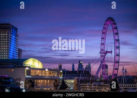 London skyline from Watrloo Bridge with pink and purple sky, London ...