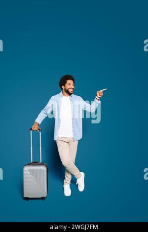 Happy hispanic man spontaneous smile and laugh Stock Photo - Alamy