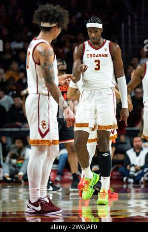 Southern California forward DJ Rodman (10) goes for a loose ball ...