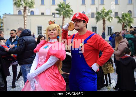 Cosplayer actors wear costumes of famous cartoon characters and ...