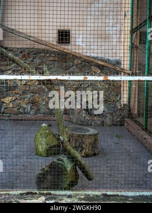 Outdoor fence at the zoo. Empty cages in the zoo. Winter at the zoo ...