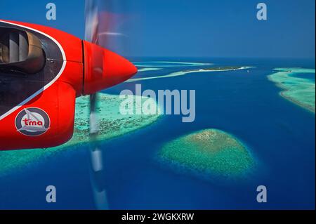 Aerial view of atolls forming part of the Maldives island chain in the ...
