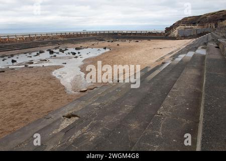 The disused outdoor tidal swimming pool at Tynemouth north east England ...