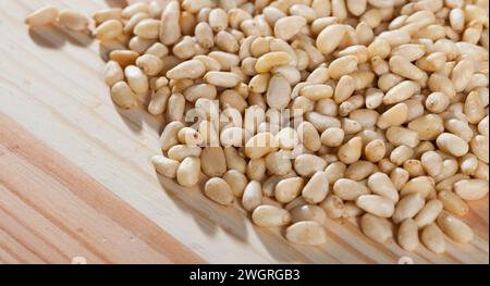 Photo of mix raw pine nut on the wooden desk Stock Photo - Alamy