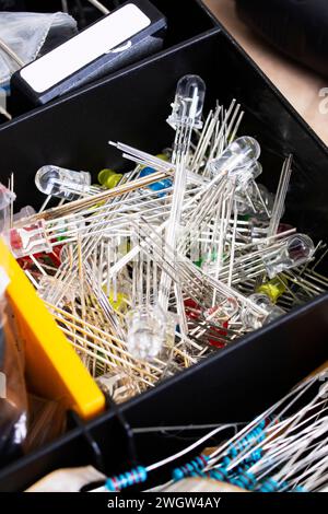 Closeup of small LED diodes inside white printed circuit board ...