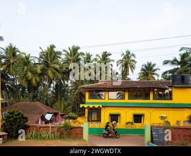Agonda, Goa, India, Yellow colonial house in the street of south Goa ...
