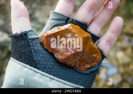 Red-brown flint with traces of retouching on the edge, Stone Age flint ...