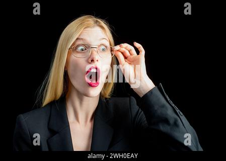 Shocked Secretary in glasses deluged by documents. Thoughtful young ...