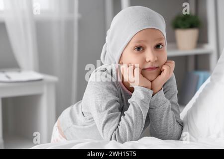 Little girl after chemotherapy in clinic. International Childhood ...