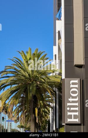 Hilton Hotel logo sign. Hilton is an international hotel and resort ...