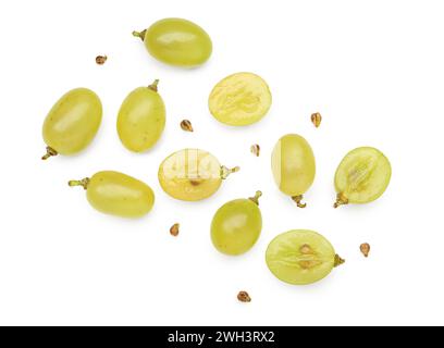 Composition with fresh ripe grapes and seeds on white background, top ...