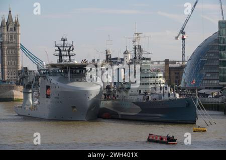 The RFA Proteus, a ship of the Royal Fleet Auxiliary, moored alongside ...