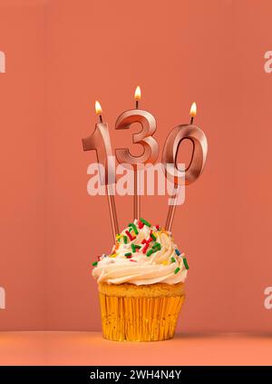 Number 130 candle with cupcake - Birthday card Stock Photo - Alamy
