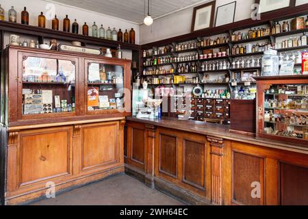 Shelves with medication at an old-fashioned Victorian chemists ...