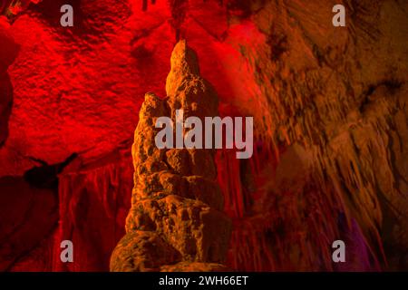 Journey through a vibrant cave adorned with colorful walls, stalactites ...