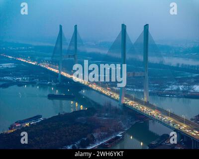 HUAI'AN, CHINA - FEBRUARY 8, 2024 - A large number of vehicles eturning ...