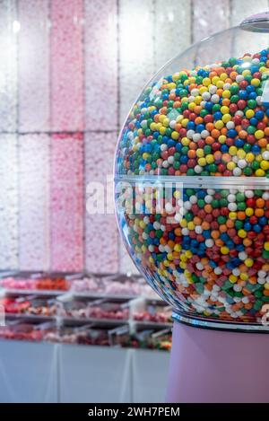 showcase of candy shop, transparent container with various sweets ...