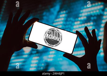 In this photo illustration, the Liberty Media Corporation logo is ...