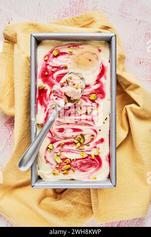 Raspberry Ripple Ice Cream WIth Pistachio on Pink & Yellow Background ...