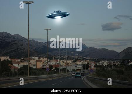 Alien spaceship flying over city in morning. UFO, extraterrestrial ...