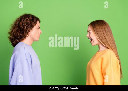 Photo of two unsatisfied angry people sitting couch yell ignore each ...