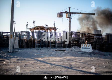 barricade made of old wooden pallets separate the road from accidental ...
