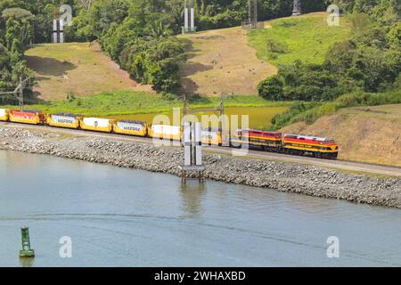Panama - 22 January 2024: Diesel locomotive pulling coaches rounding a ...