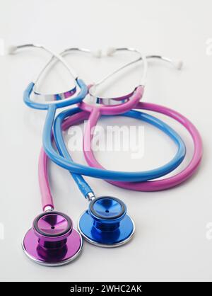 Pink and blue stethoscopes Stock Photo - Alamy