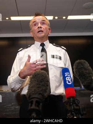 Commander Jon Savell speaking to the media at Scotland Yard in London ...