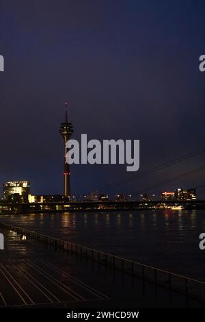 View over the Rhine with television tower and cargo ship, Duesseldorf ...