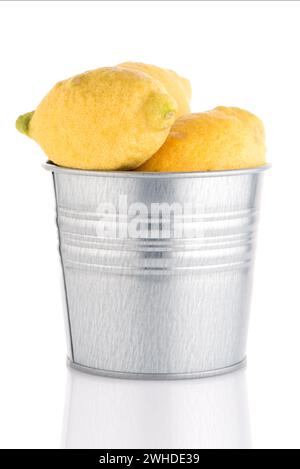 Bucket with lemons Stock Photo - Alamy