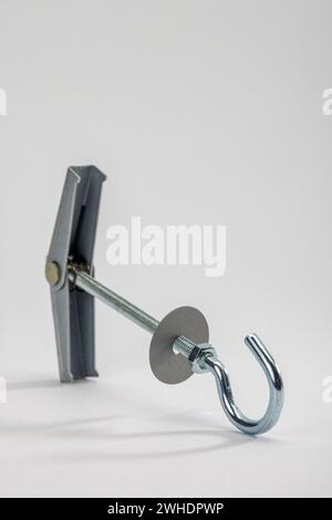 Spring-loaded dowel, cavity dowel, white background Stock Photo - Alamy