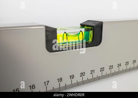 Spirit level, dragonfly, detail, gray, white background Stock Photo - Alamy