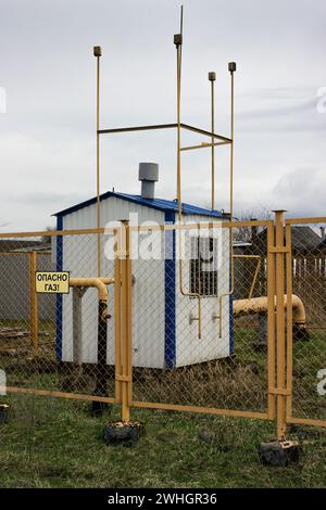 Poster on gas regulatory point. Inscription: Inscription: Dangerously ...