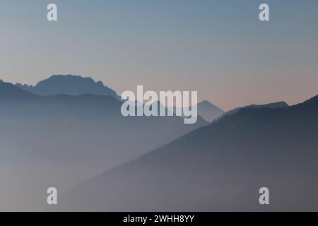 Spectacular mountain ranges silhouettes in shades of green Stock Photo ...