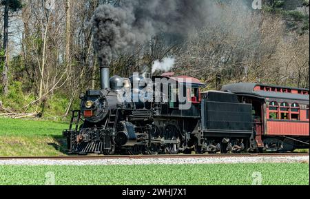 An Angled View of a Restored Steam Passenger Train Moving Slowly ...
