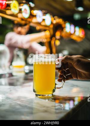 Freshly Poured Beer In A Glass Stock Photo - Alamy