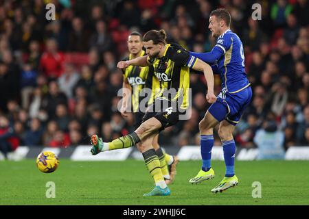 Watford's Wesley Hoedt (left) and Leicester City's Jamie Vardy (right ...