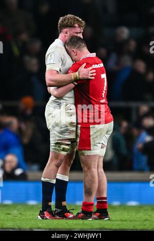 Ollie Chessum of England consoles club team mate Tommy Reffell of Wales ...